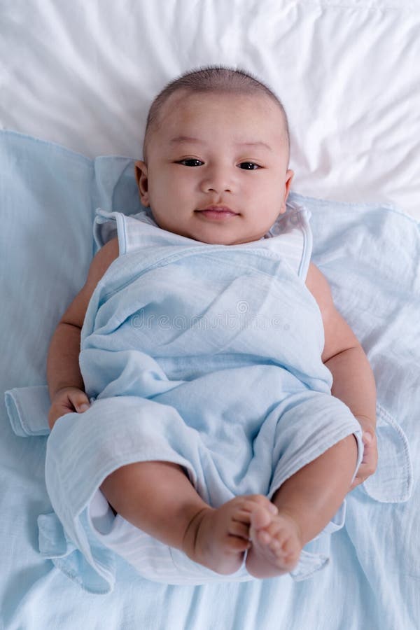 Baby Move Leg in the Air on a Bed Stock Photo - Image of legs, happy ...