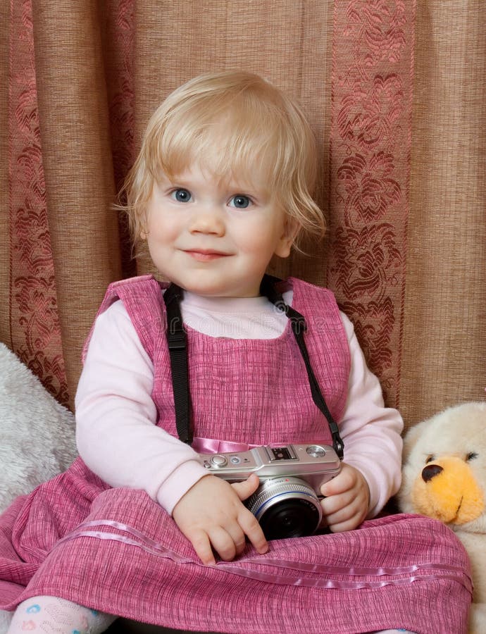 Little baby photographer stock photo. Image of blonde - 13913484