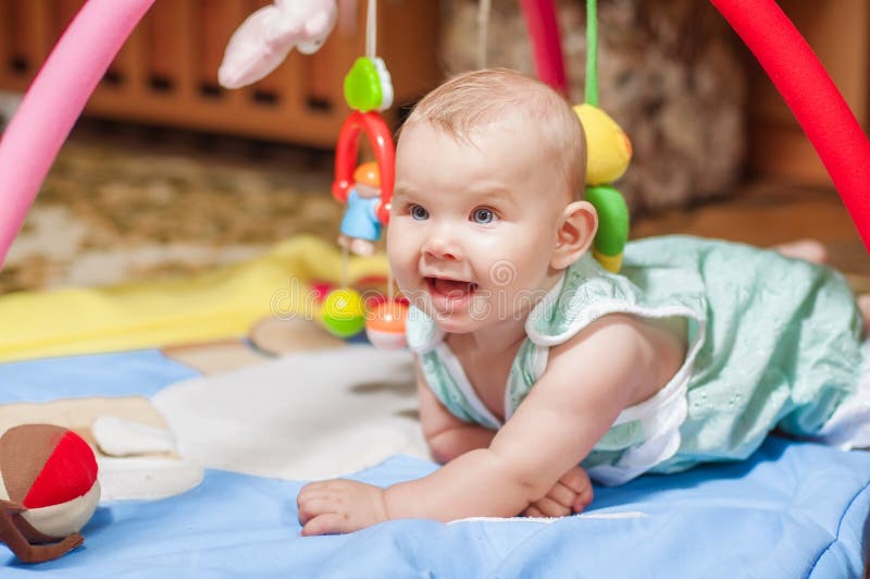 Little Baby Playing with Toys Stock Photo - Image of home, clothing ...
