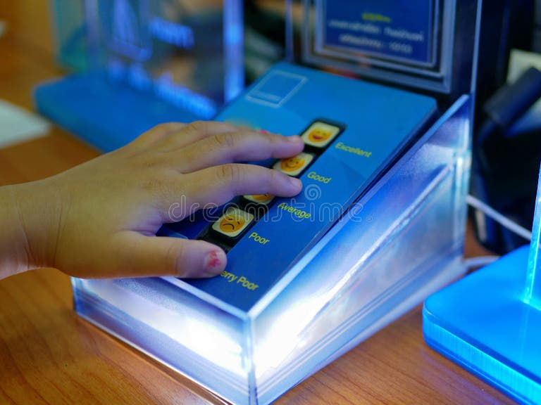 Little Baby`s Hand on a Push Button Feedback Device for Customer`s ...