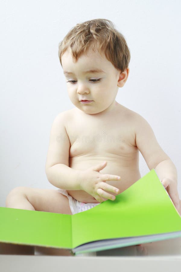 Little Baby Scanning a Big Book Stock Photo - Image of gesture ...