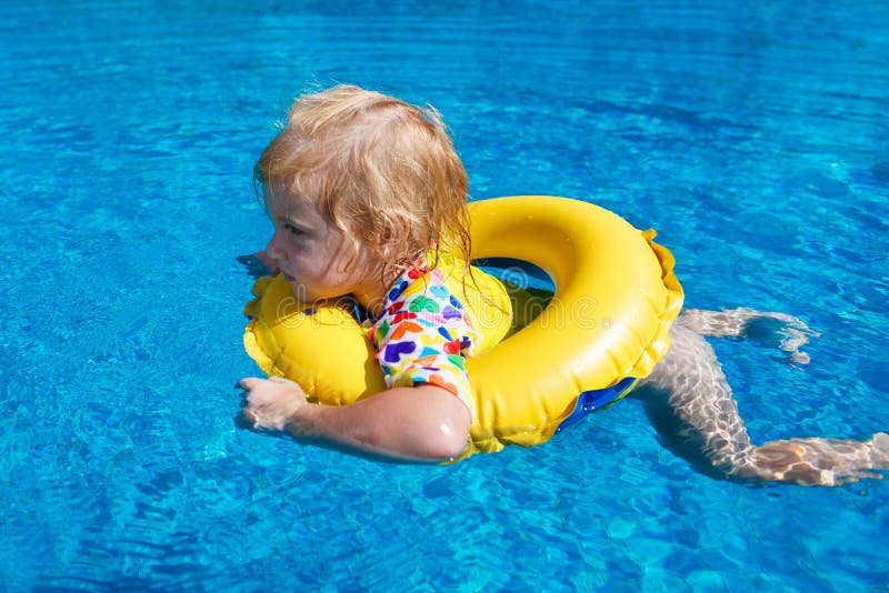 Little Baby Swimming in a Pool Stock Photo - Image of beautiful, months ...