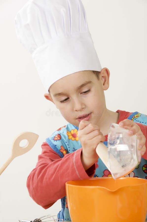 Little baker stock image. Image of spoon, cute, apron - 4616701