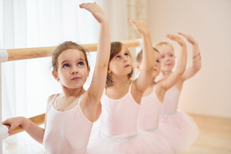 Little Ballerinas Preparing for Performance by Practicing Dance Moves Stock Image - Image of ...