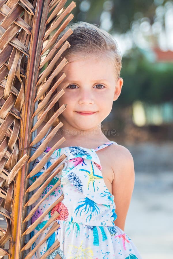 Little Beautiful Girl Posing on the Beach Stock Photo - Image of ... Little Beautiful Girl Posing on the Beach Stock Photo - Image of ...