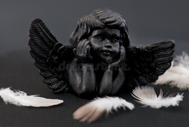 Black angel and stone stock image. Image of statue, stone - 13541029