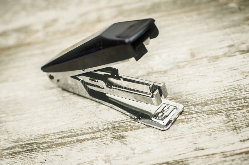 Little black stapler stock image. Image of close, punching - 61987217