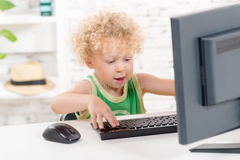 1,298 Little Boy Computer Keyboard Photos - Free & Royalty-Free Stock ...