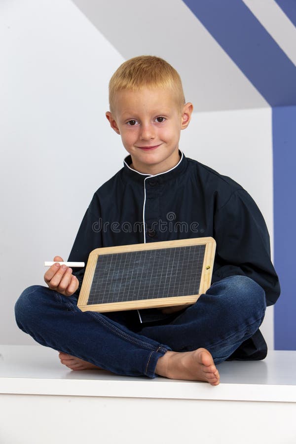 Little Blond Boy Sitting with a Chalk Slate Stock Image - Image of ... Little Blond Boy Sitting with a Chalk Slate Stock Image - Image of ...