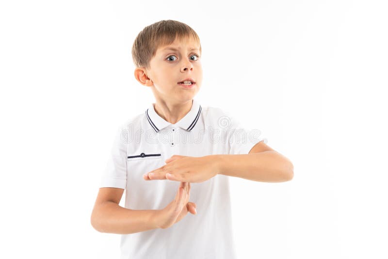 A Little Blonde Boy Shows Timeout, Picture Isolated on White Background ...
