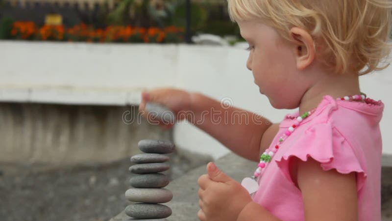 Little Blonde Girl Moves on a Zipline of Outdoor Climbing Park Trail in ...