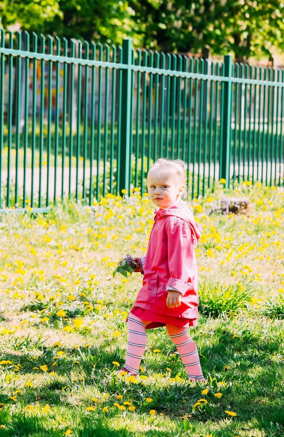 Little Blonde Girl Walk in a Spring Park Stock Photo - Image of spring ...