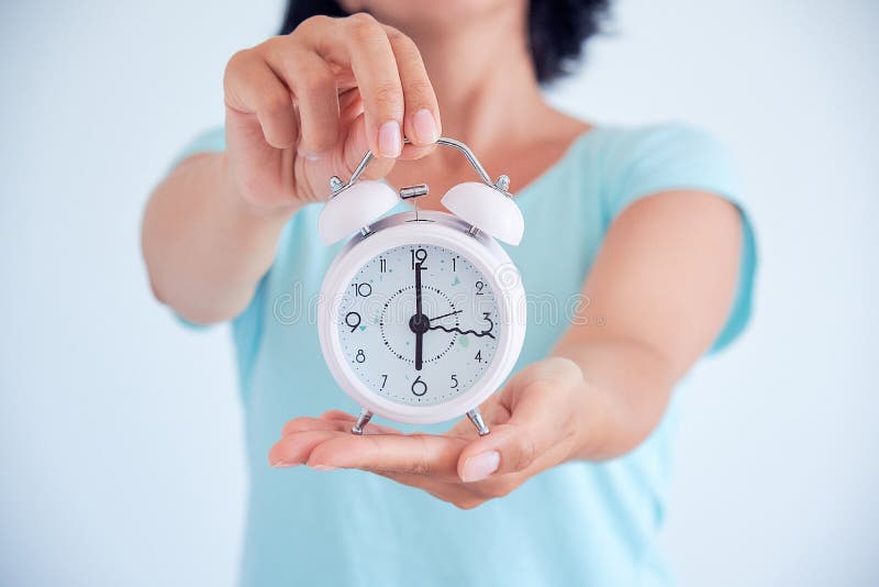 Little Blue Alarm Clock in the Hands of Woman, the Concept of Saving ...