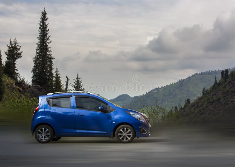 Little blue car traveling. stock image. Image of little - 155552383