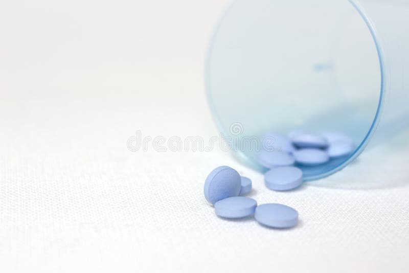 Little blue pills stock image. Image of isolated, prescription - 15957503