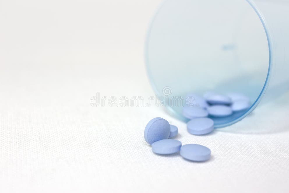 Little blue pills stock image. Image of isolated, prescription - 15957503