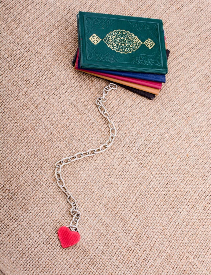Little Books Attached To a Heart with a Chain Stock Photo - Image of ...