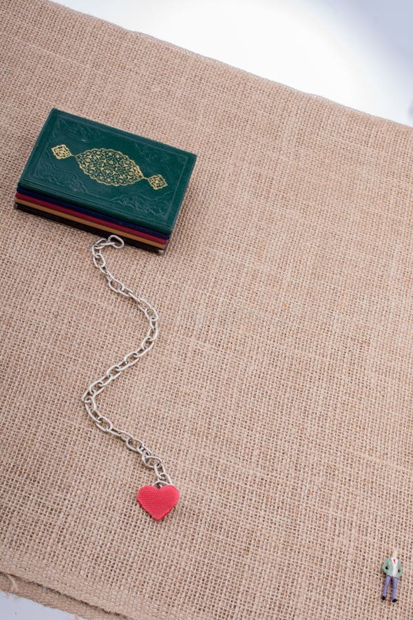 Little Books Attached To a Heart with a Chain Stock Photo - Image of ...