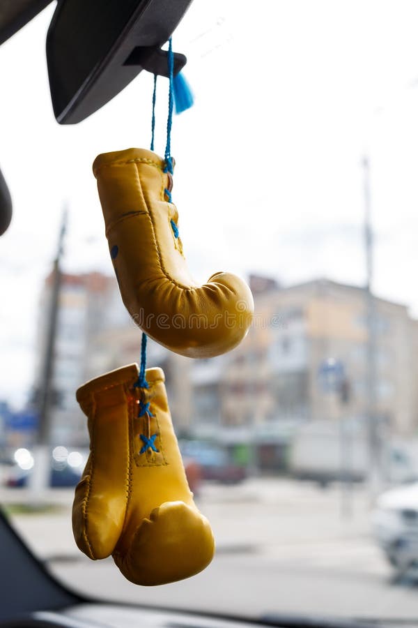 Little Boxing Gloves on the Rearview Mirror in a Car Stock Photo ...