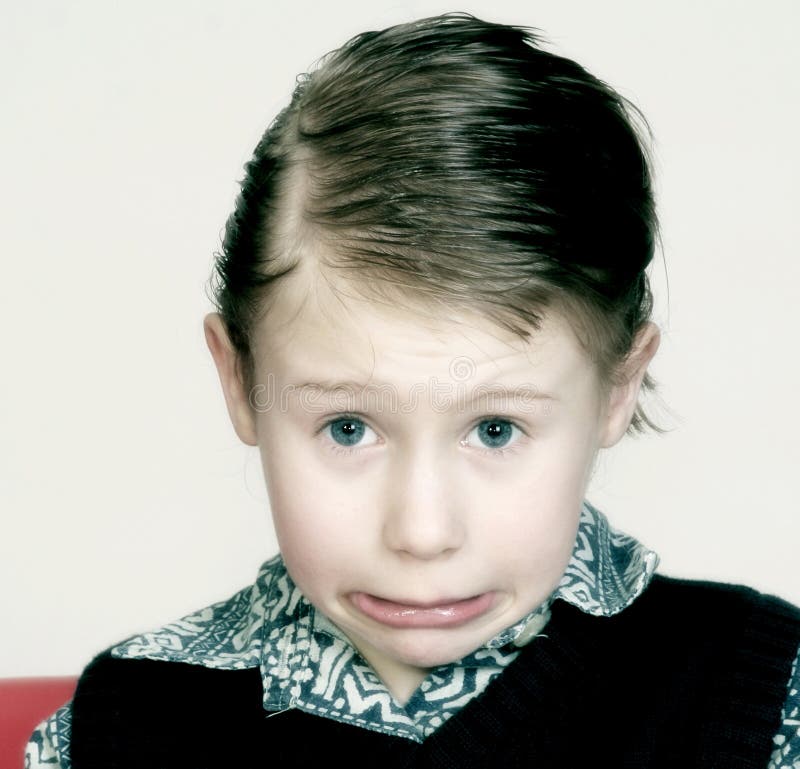 Sullen young boy stock photo. Image of expression, displeased - 1839988