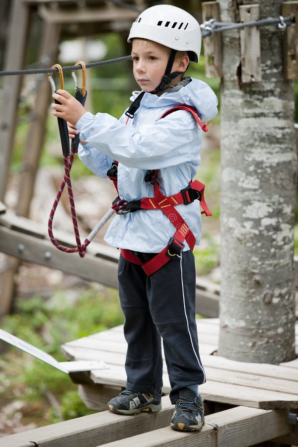 Little Boy in Adventure Park Stock Photo - Image of jacket, equipment ...