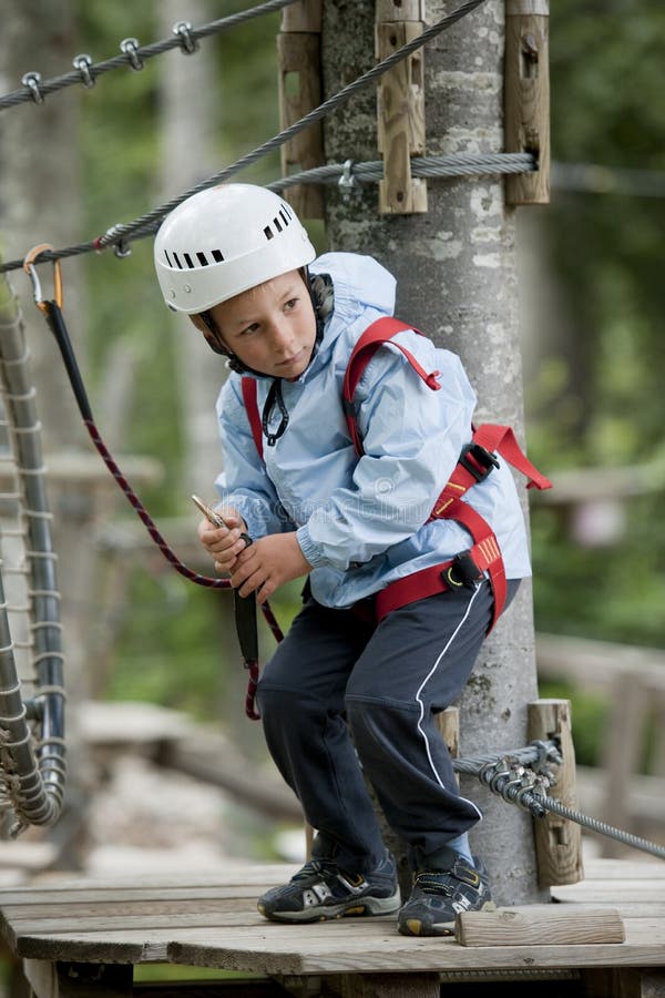 Little Boy in Adventure Park Stock Image - Image of extreme, safety ...