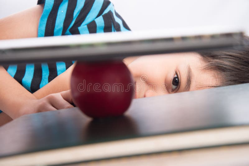 Little Boy with Apple on the Book on His Head Education Concept Back To ...