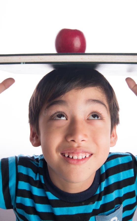 Little Boy with Apple on the Book on His Head Education Concept Back To ...