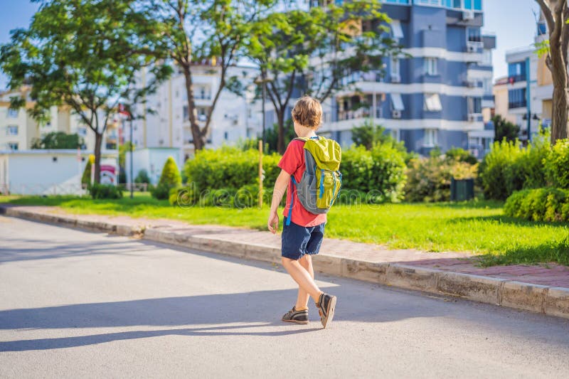 Little Boy with a Backpack Go To School. Back View Stock Photo - Image ...