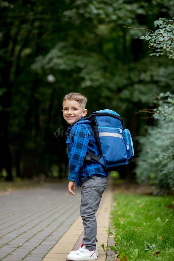 Little Boy with Backpack Going To School. Rear View Stock Photo - Image ...