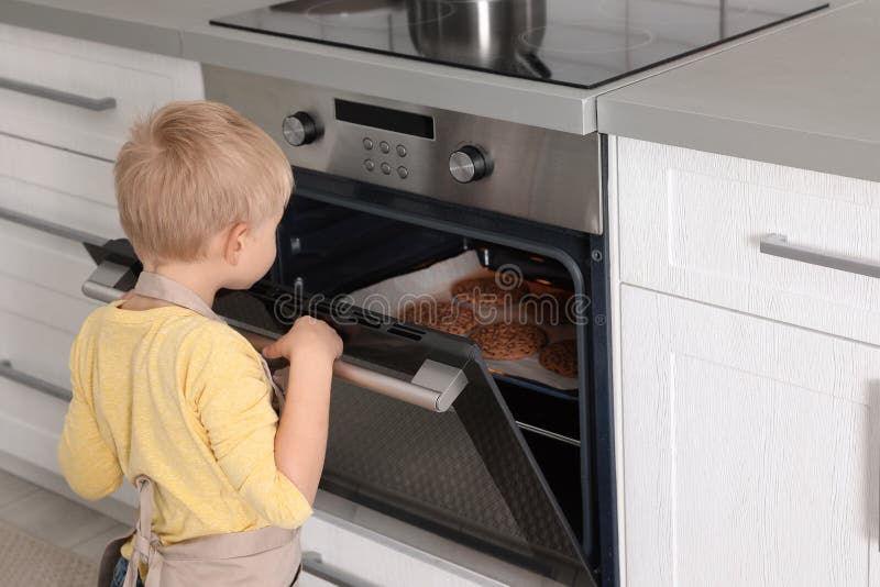 Little Boy Baking Cookies in Oven Stock Image - Image of cook, domestic ...