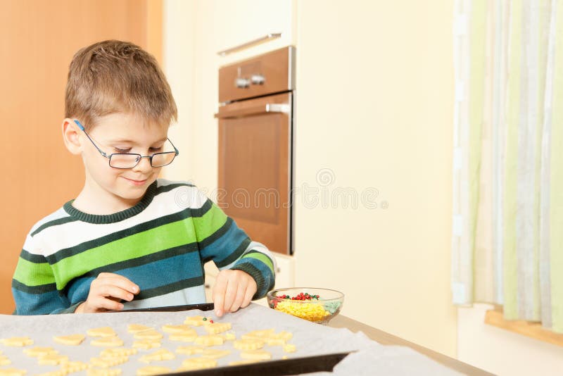 Little boy is baking stock image. Image of cooks, bake - 46384363