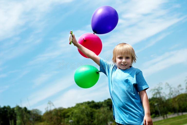 The Little Boy with Balloons Stock Photo - Image of childhood, color ...