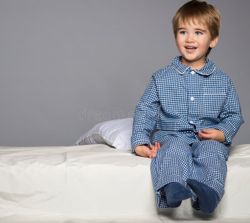 Little boy in bed stock image. Image of joyful, face - 32089273