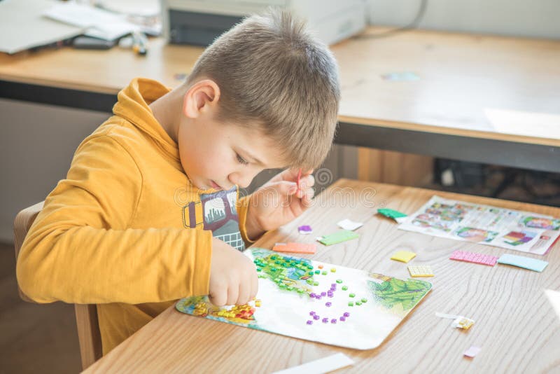 Little Boy Being Creative Making Homemade Do it Yourself Dinosaur ...