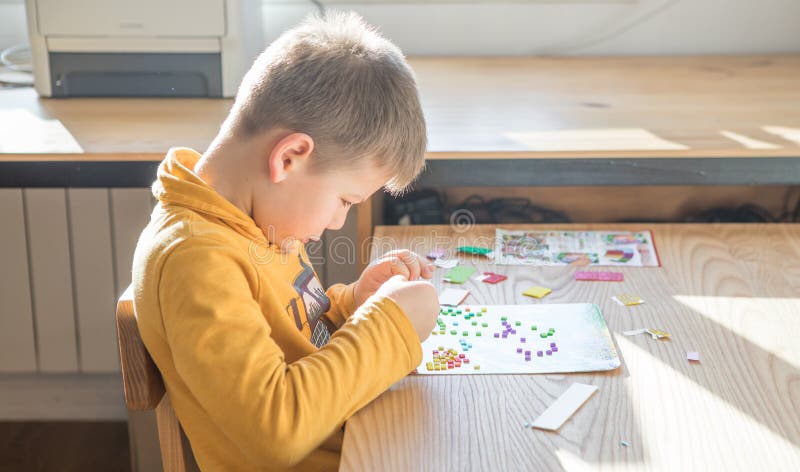 Little Boy Being Creative Making Homemade Do it Yourself Dinosaur ...