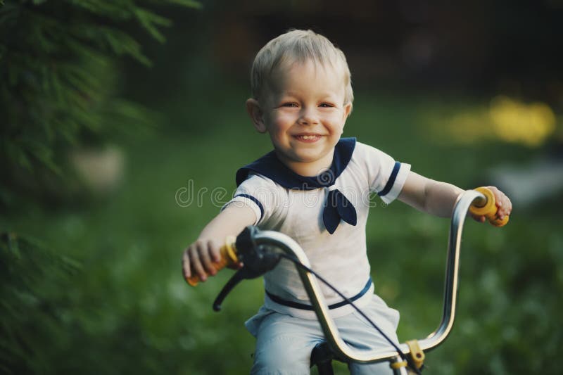 Little boy with bicycle stock image. Image of male, cycling - 32931971