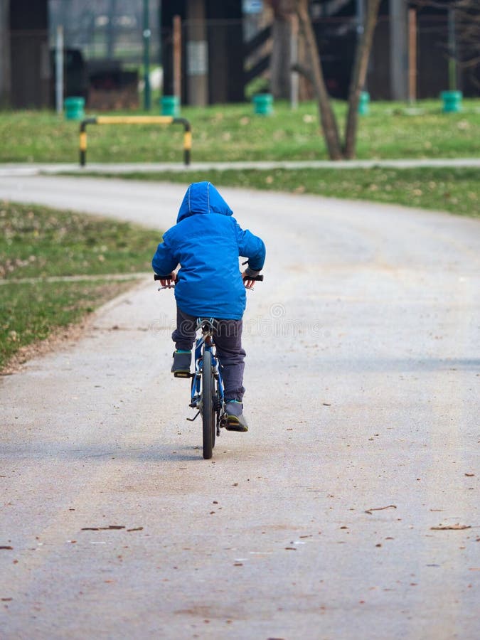 Little Boy with Bicycle in Park Stock Image - Image of blue, riding ...