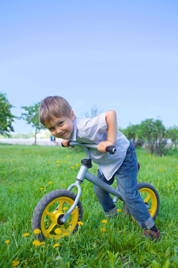 Little boy on a bicycle stock photo. Image of happy, active - 31288934