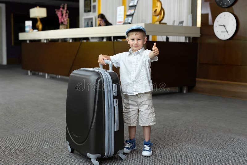 Little Boy with a Big Suitcase in the Hotel Stock Image - Image of cute ...