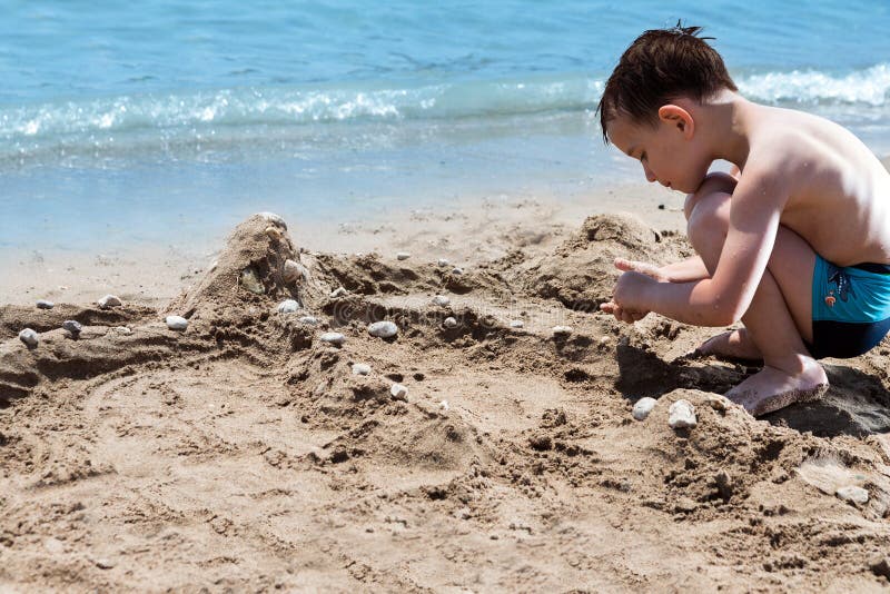 Little Boy in Blue Sea and Play with Sand Stock Image - Image of ...
