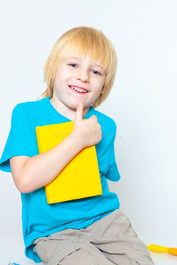 Little Boy with a Book on a Light Background Stock Photo - Image of ...