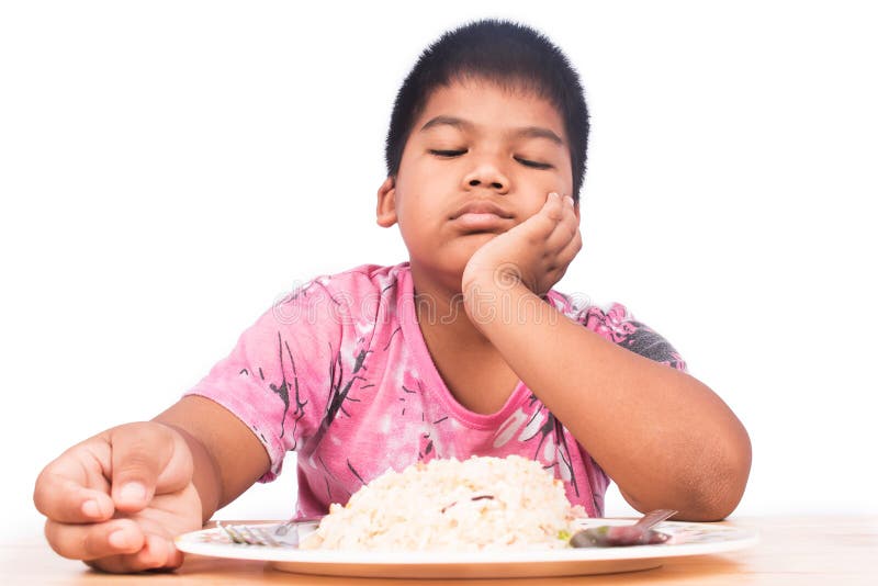 Little boy bored with food stock photo. Image of diet - 76788612