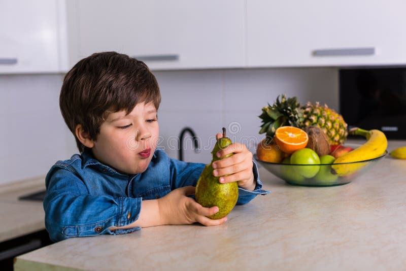 Little Boy with a Bowl of Fresh Fruits Stock Photo - Image of eating ...