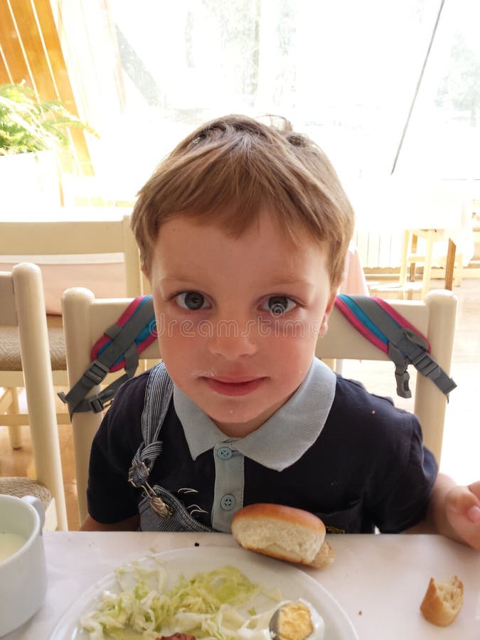 Little Boy at a Breakfast Tables Stock Image - Image of enjoy, toddler ...