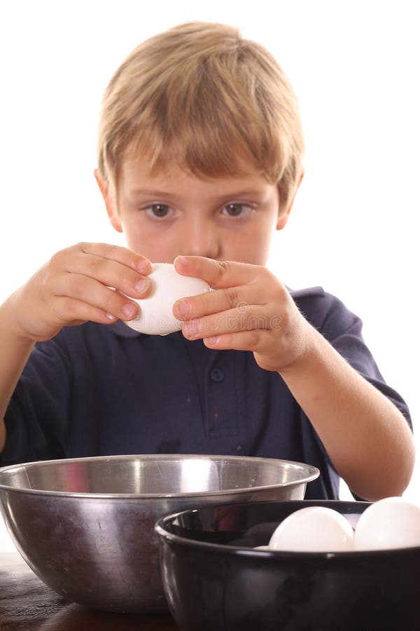Little Boy Breaking An Egg Picture. Image: 6798965