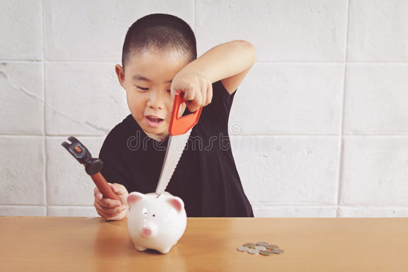 Little Boy Breaking a Piggy Bank. Stock Image - Image of broken ...