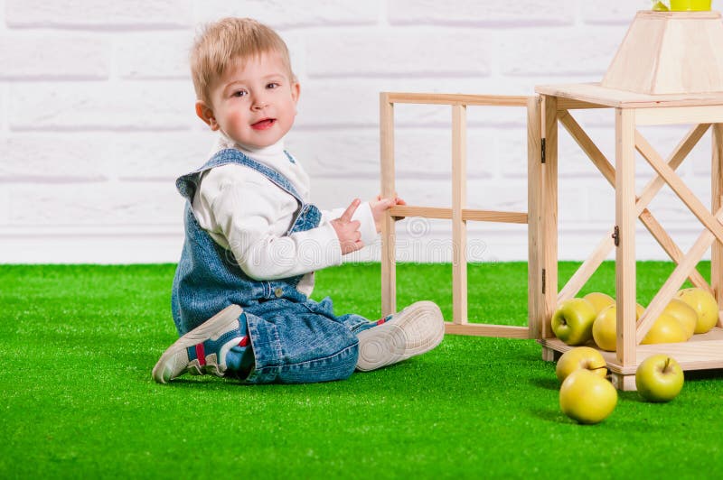 Little Boy with Bright Colors and Spring Flowers Stock Photo - Image of ...