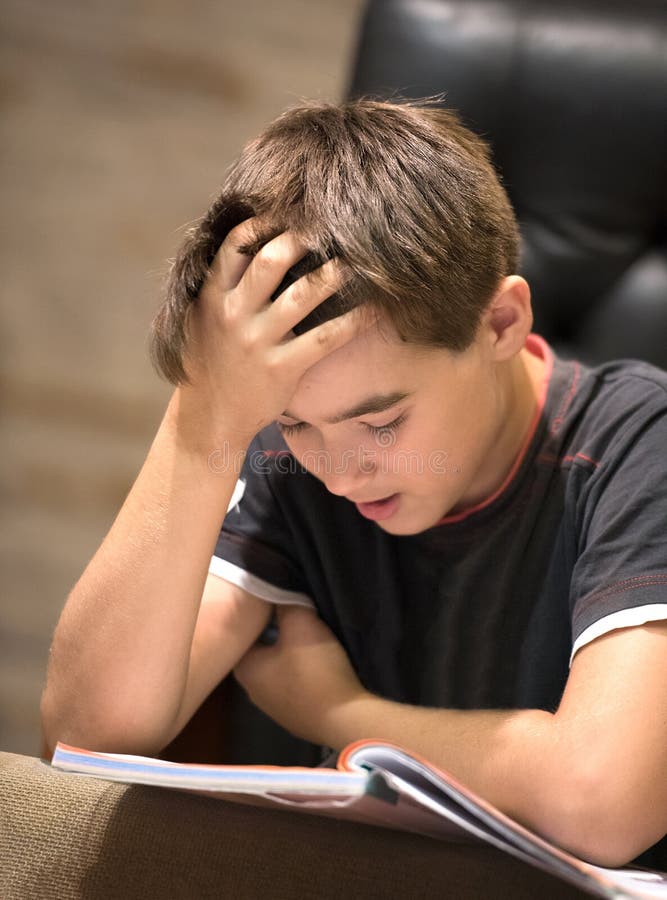 Little Boy with Brown Hair Reading His Homework. Stock Image - Image of ...