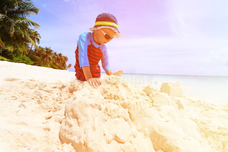 Little Boy Building Sandcastle on Tropical Beach Stock Photo - Image of ...